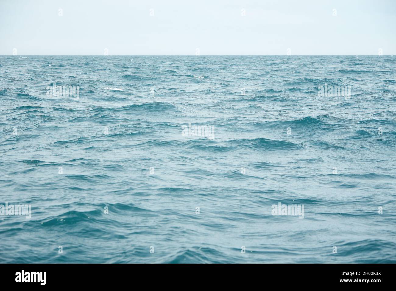Horizon sea with waves after storm. sparkler in water - background. sea ...