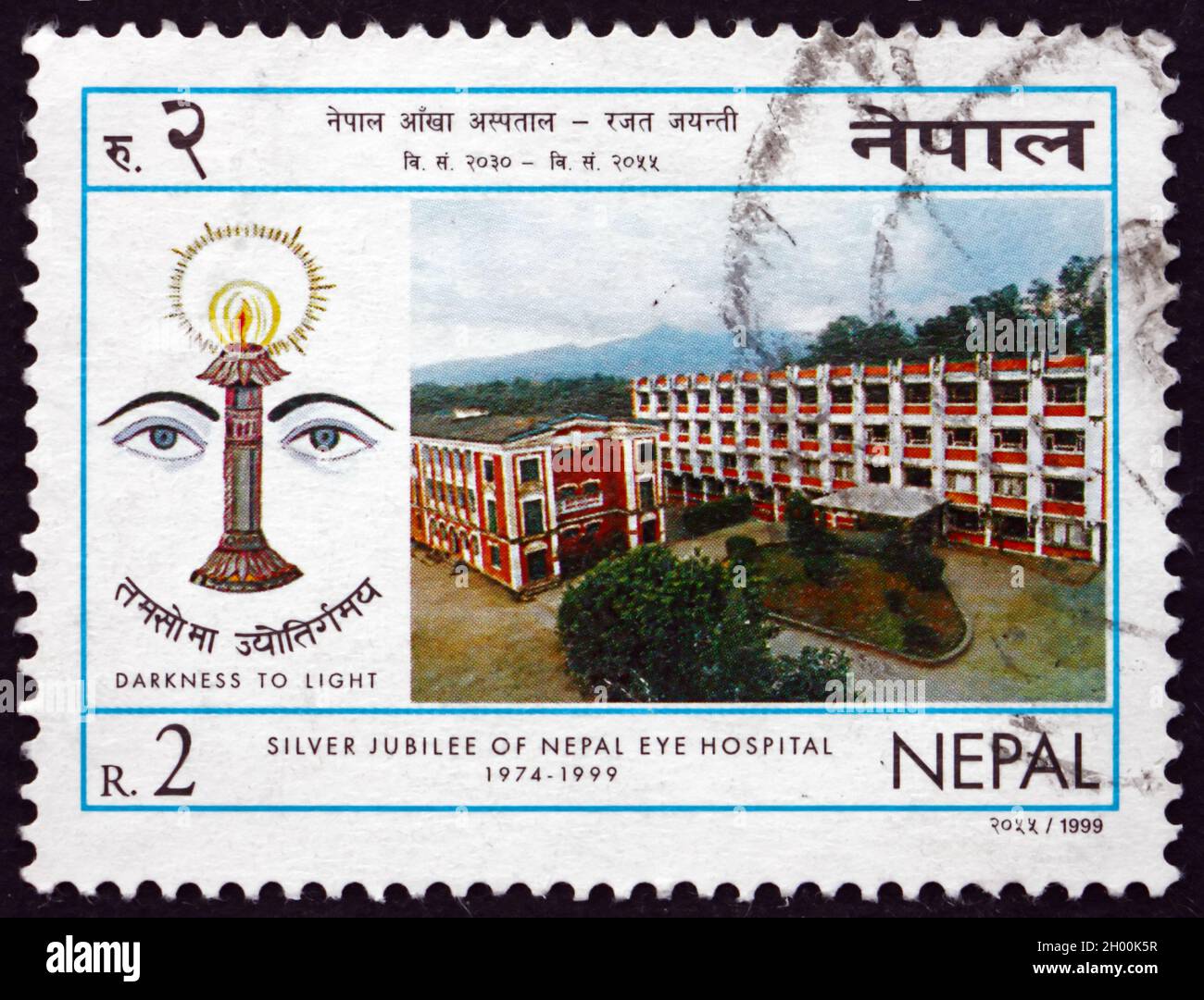 NEPAL - CIRCA 1999: a stamp printed in the Nepal shows Nepal Eye ...