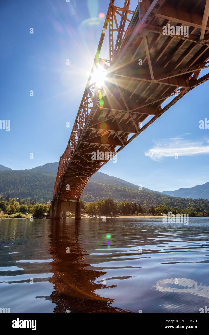 Big Orange Bridge over Kootenay River with Touristic Town Stock Photo ...