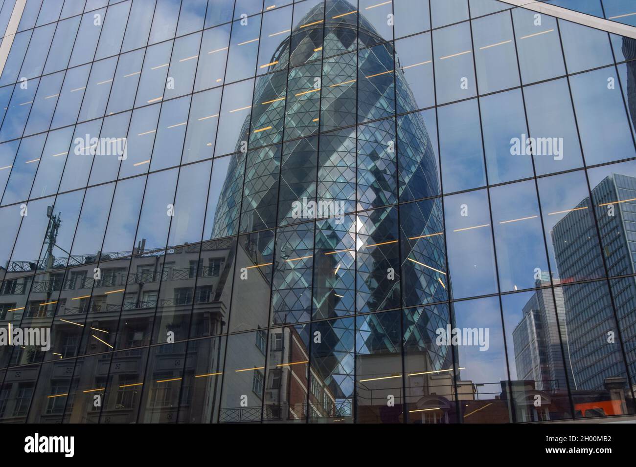 30 St Mary Axe, widely known as The Gherkin Building, reflected in an ...