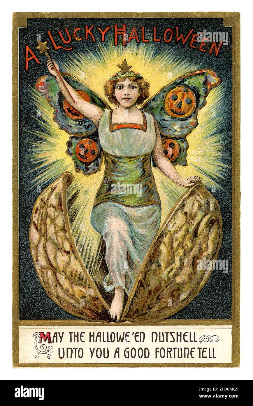 Vintage Halloween greeting card / postcard. Early 1900s. A Lucky Halloween. A girl and a ...