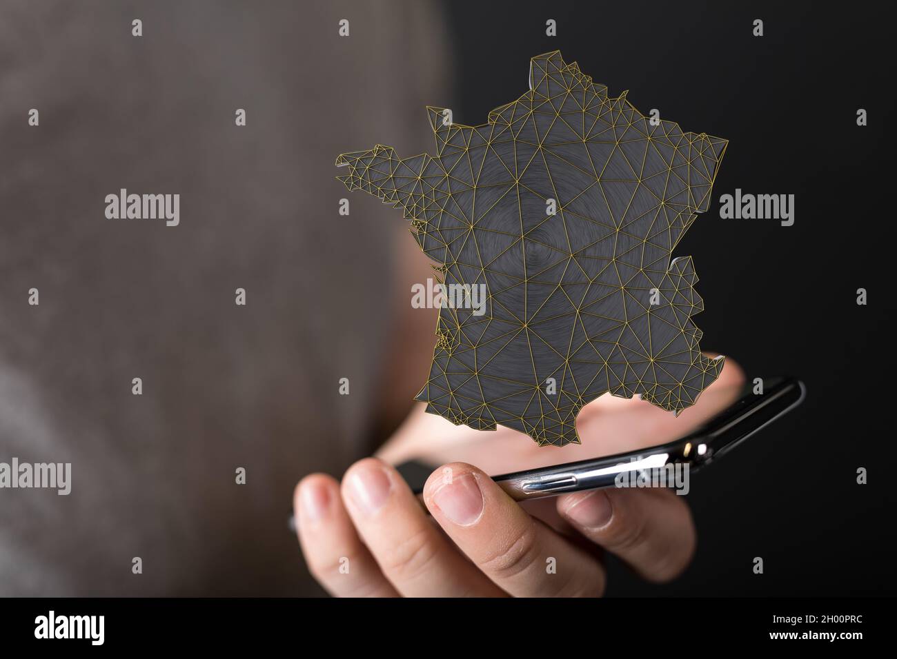 A 3D illustration of the map of France above a smartphone Stock Photo ...