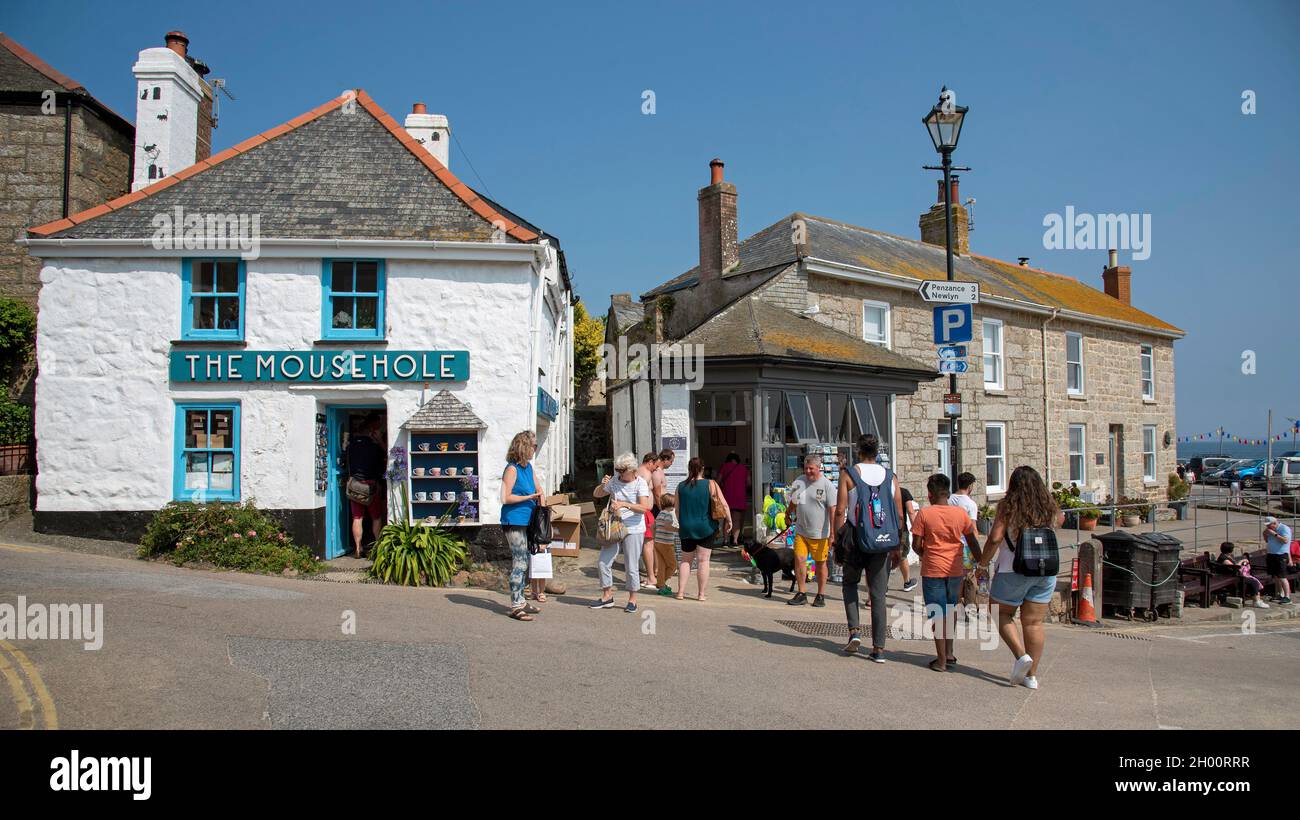 Mousehole, Cornwall, England UK. 2021. Holidaymakers shopping in the ...