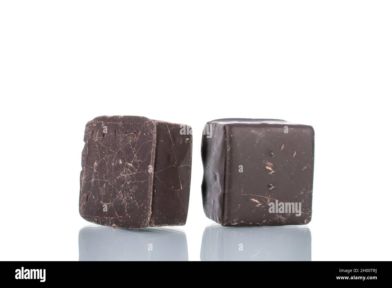 Two sweet chocolate candies, close-up, isolated on white Stock Photo ...