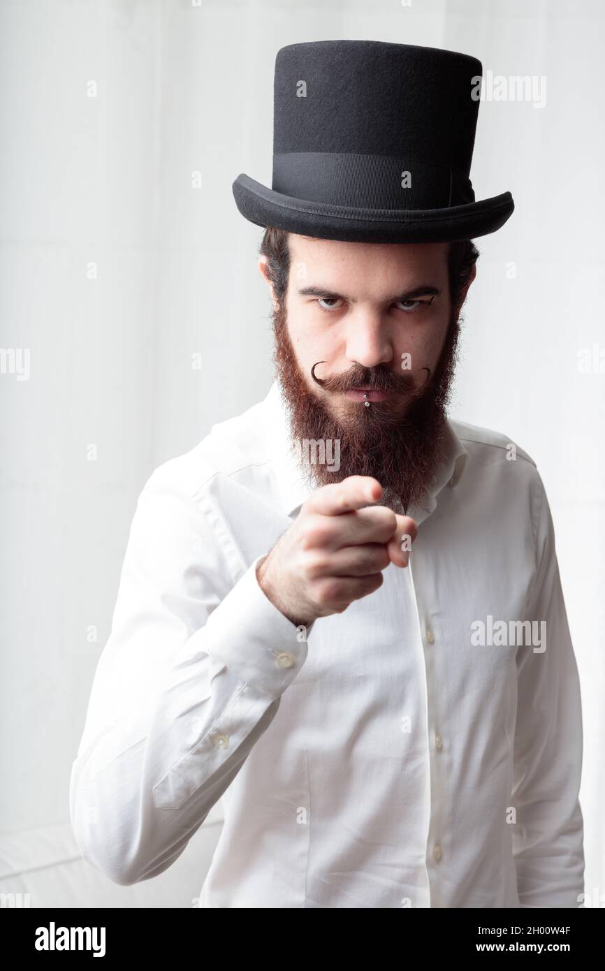 young man playing uncle sam want you pose, pointing index finger to you ...