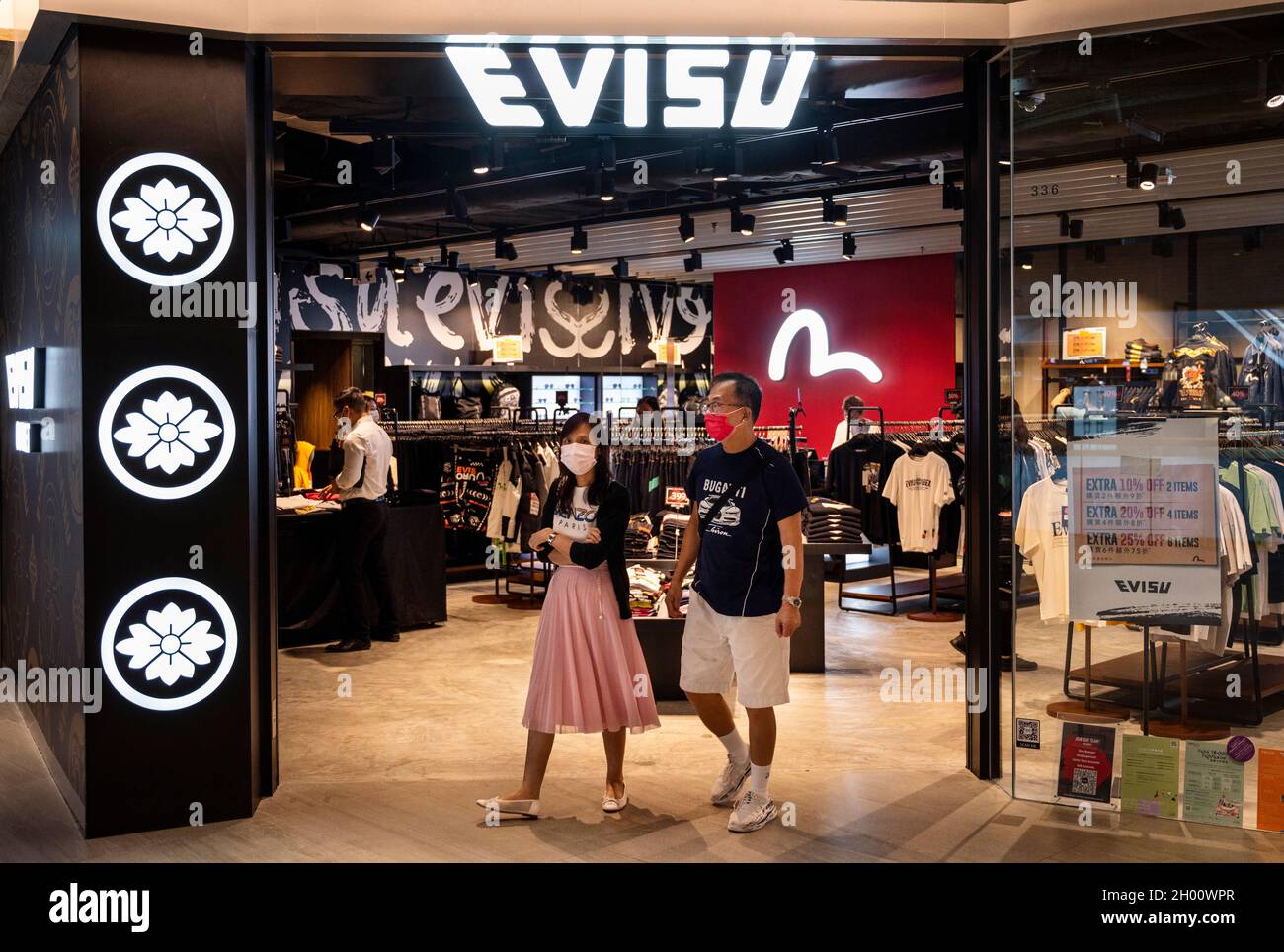 Shoppers are seen at the Japanese clothing brand Evisu store seen in ...