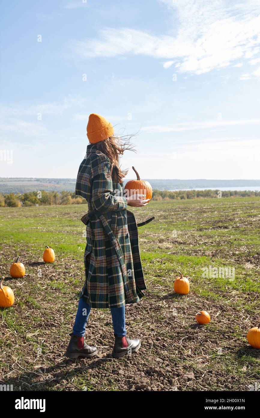 Woman and pumpkin hi-res stock photography and images - Alamy