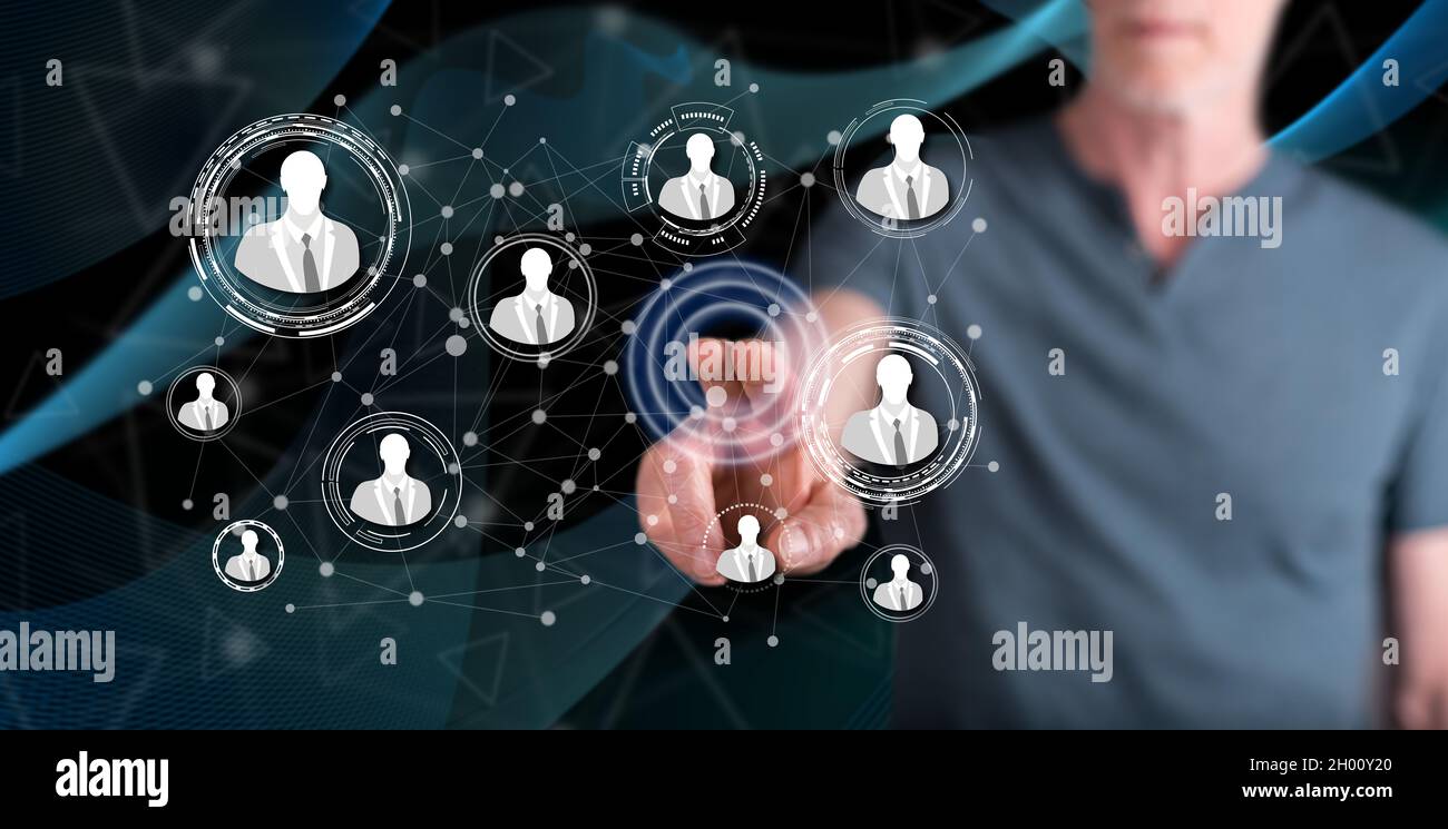 Man touching a cooperation concept on a touch screen with his finger ...