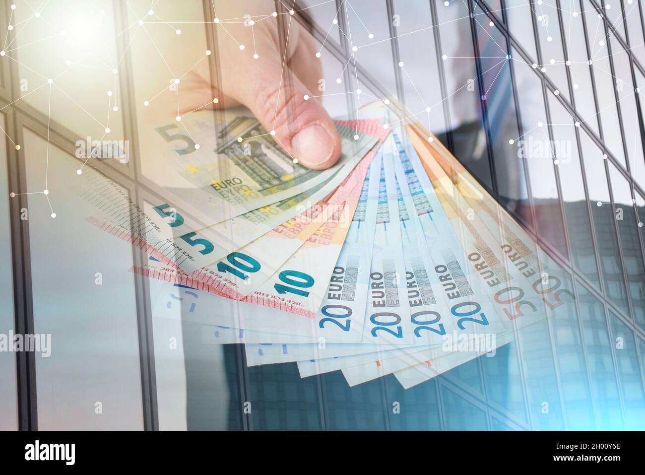 Man hand holding different euro notes; multiple exposure Stock Photo ...