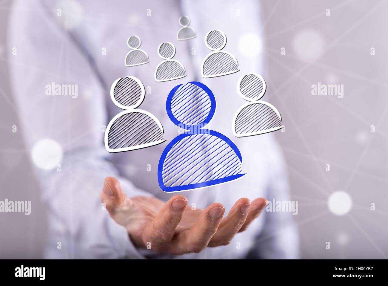 Leadership concept above the hand of a man in background Stock Photo ...