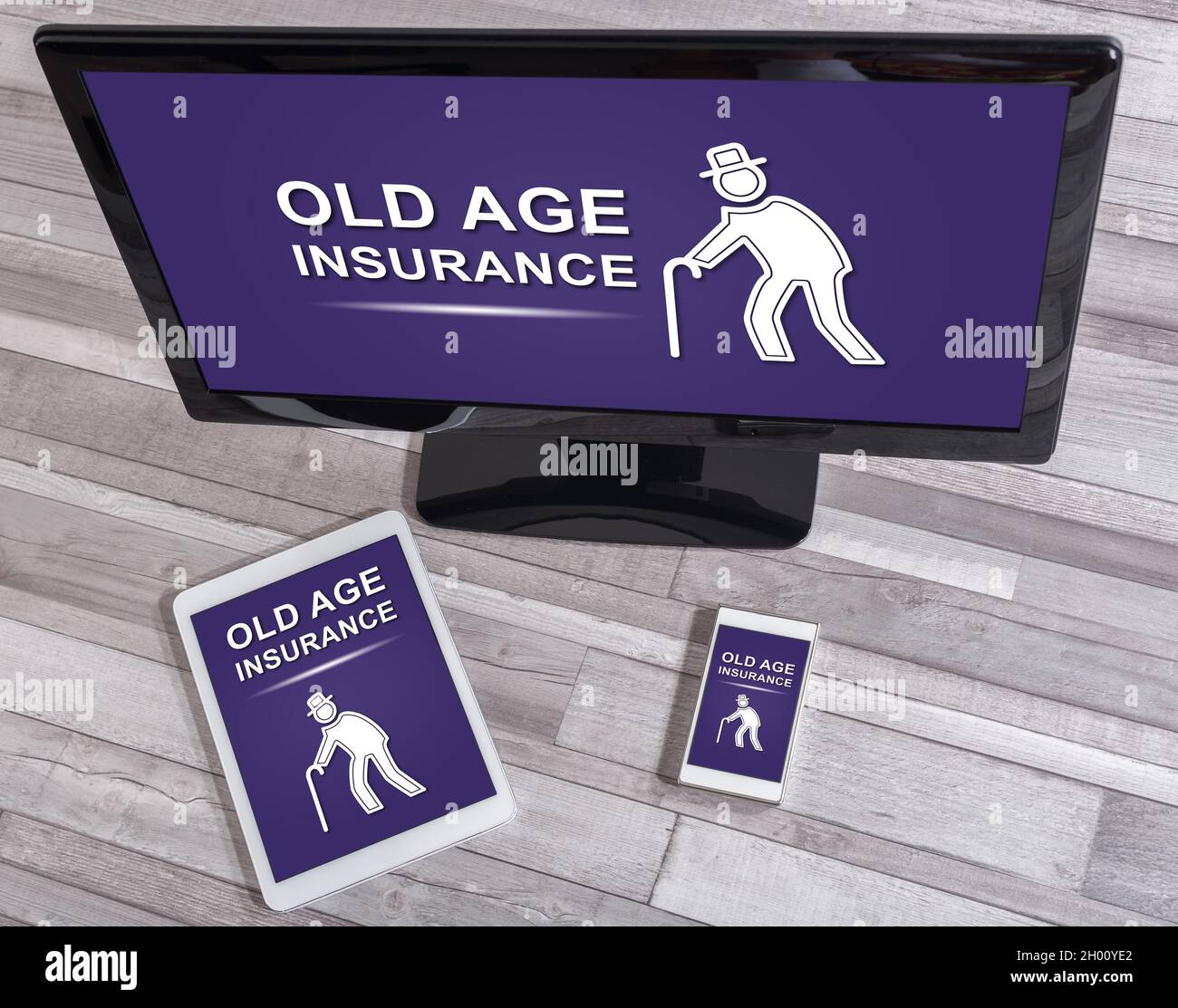 Old age insurance concept shown on different information technology ...