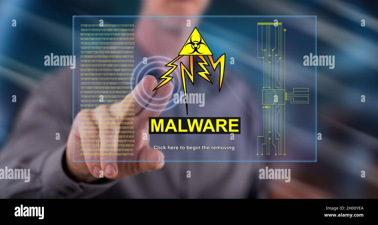 Man touching a malware concept on a touch screen with his finger Stock ...