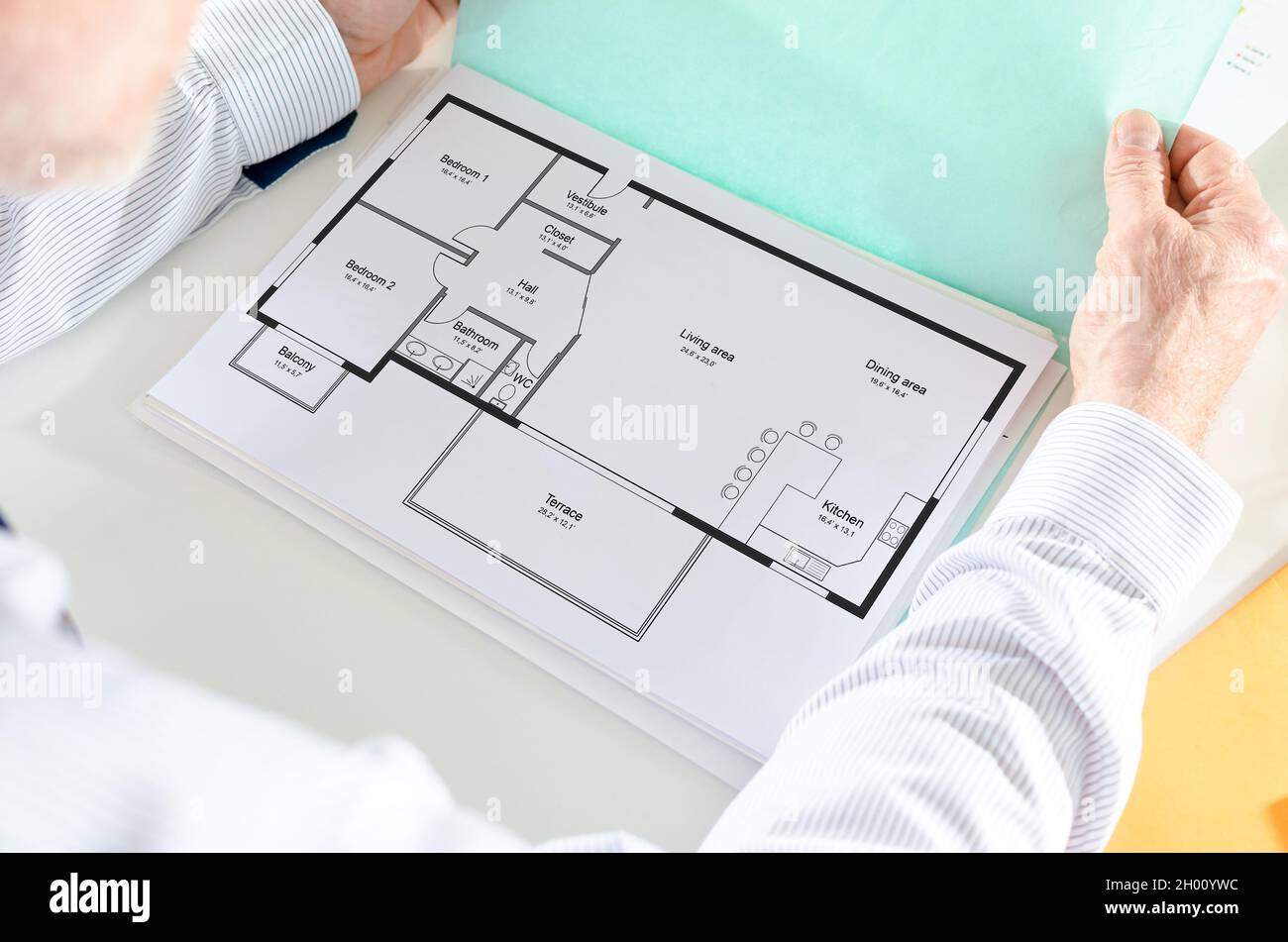 Architect holding floorplan hi-res stock photography and images - Alamy