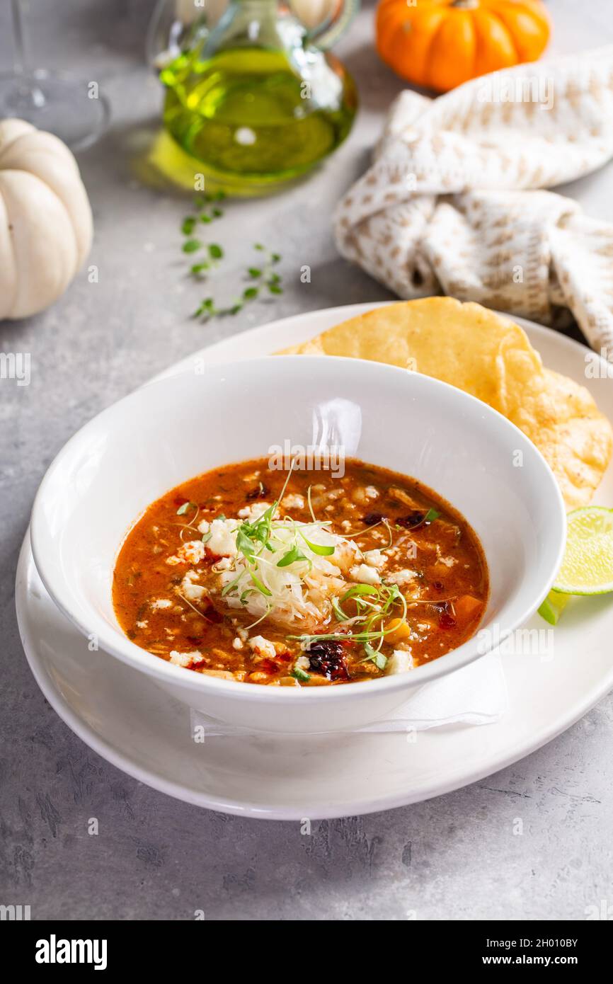 Mexican chicken soup topped with cotija cheese Stock Photo - Alamy