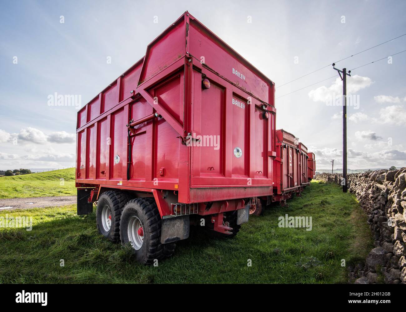 Line of parked up agricultural trailers near Little Newton, Hellifield ...