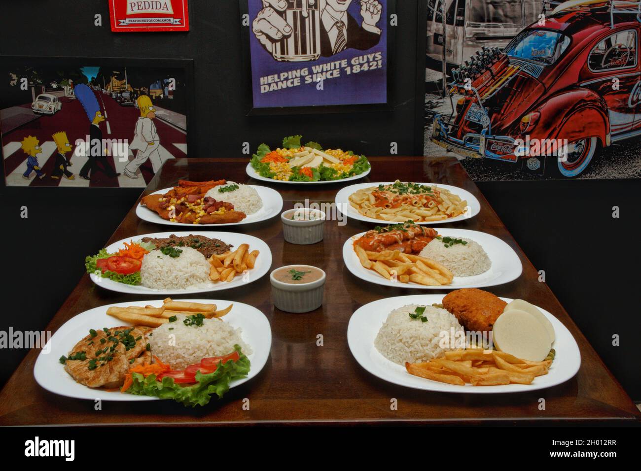 various food dishes, pizza, sphirra, snacks and various Stock Photo - Alamy