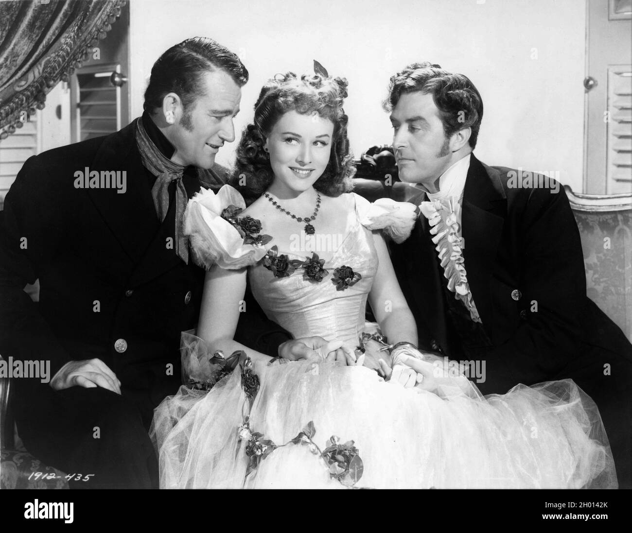 JOHN WAYNE PAULETTE GODDARD and RAY MILLAND Publicity Portrait in REAP ...