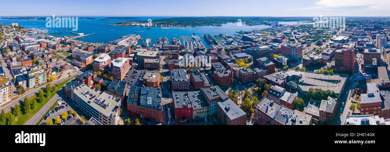 Panoramic aerial view of Munjoy Hill on the left and Portland Old Port ...