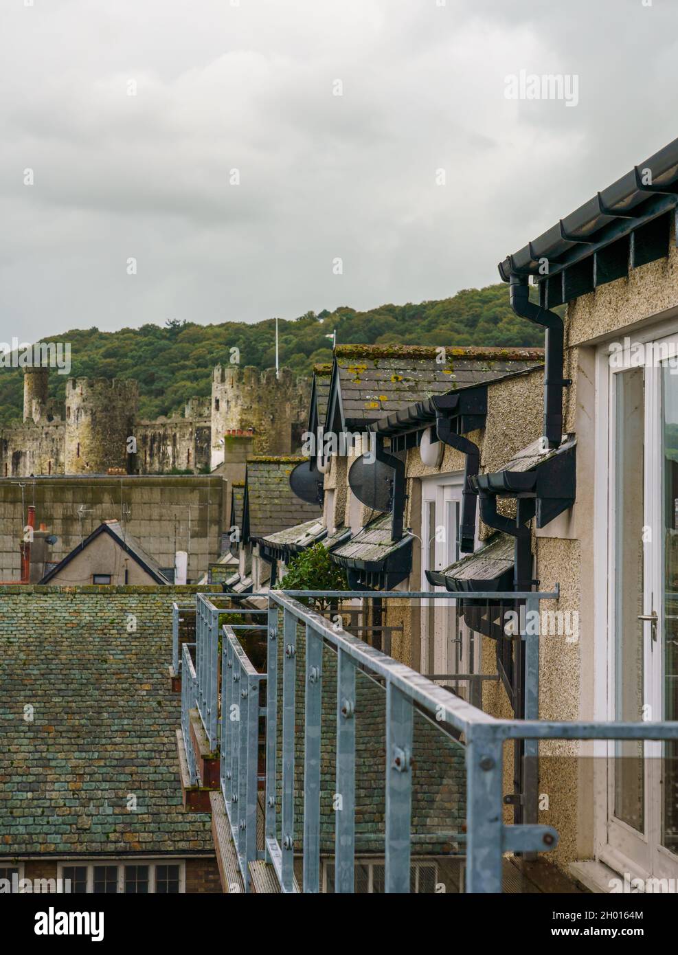 looking along modern frontage with satellite dishes toward the well ...