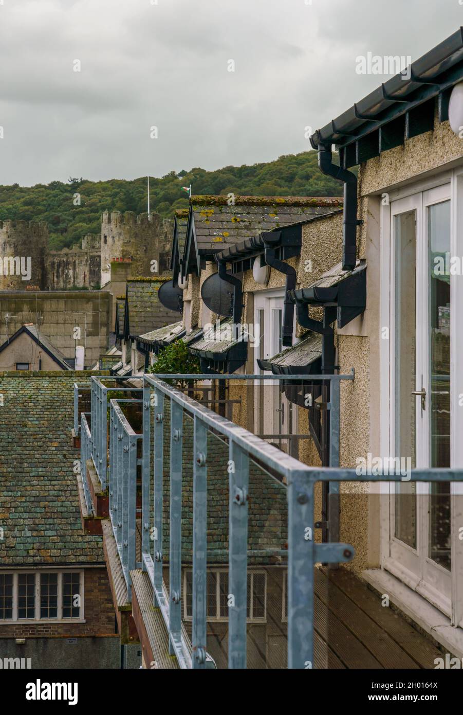 looking along modern frontage with satellite dishes toward the well ...