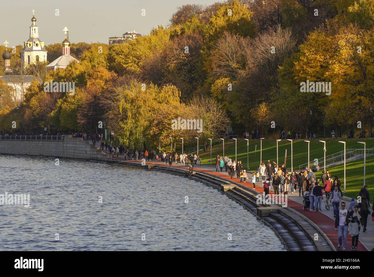 Moscow, Russia. 10th Oct, 2021. People walk by the Moskva River in ...