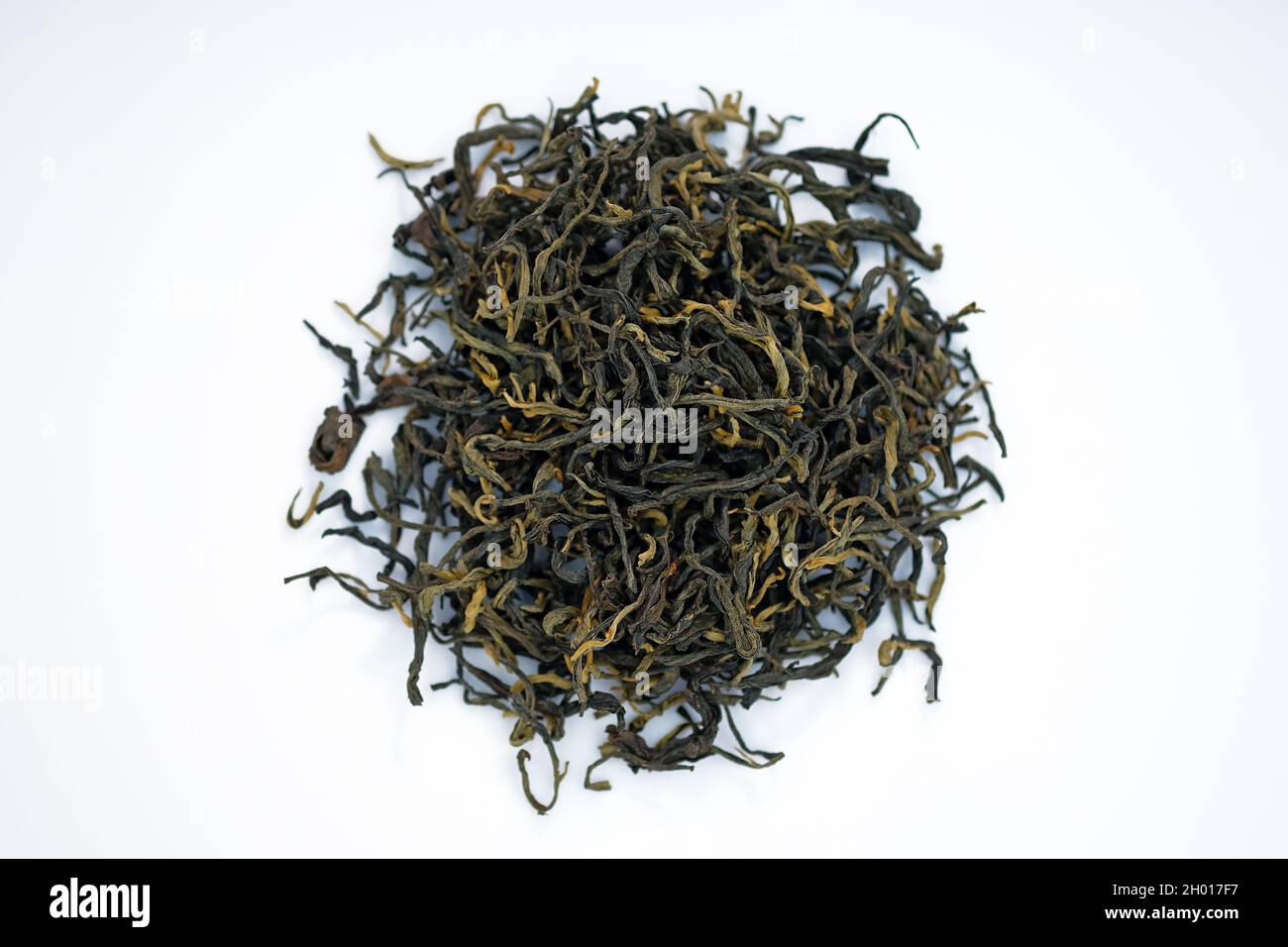 Dry red tea on a white background. Dry tea leaves top view. Dry black ...