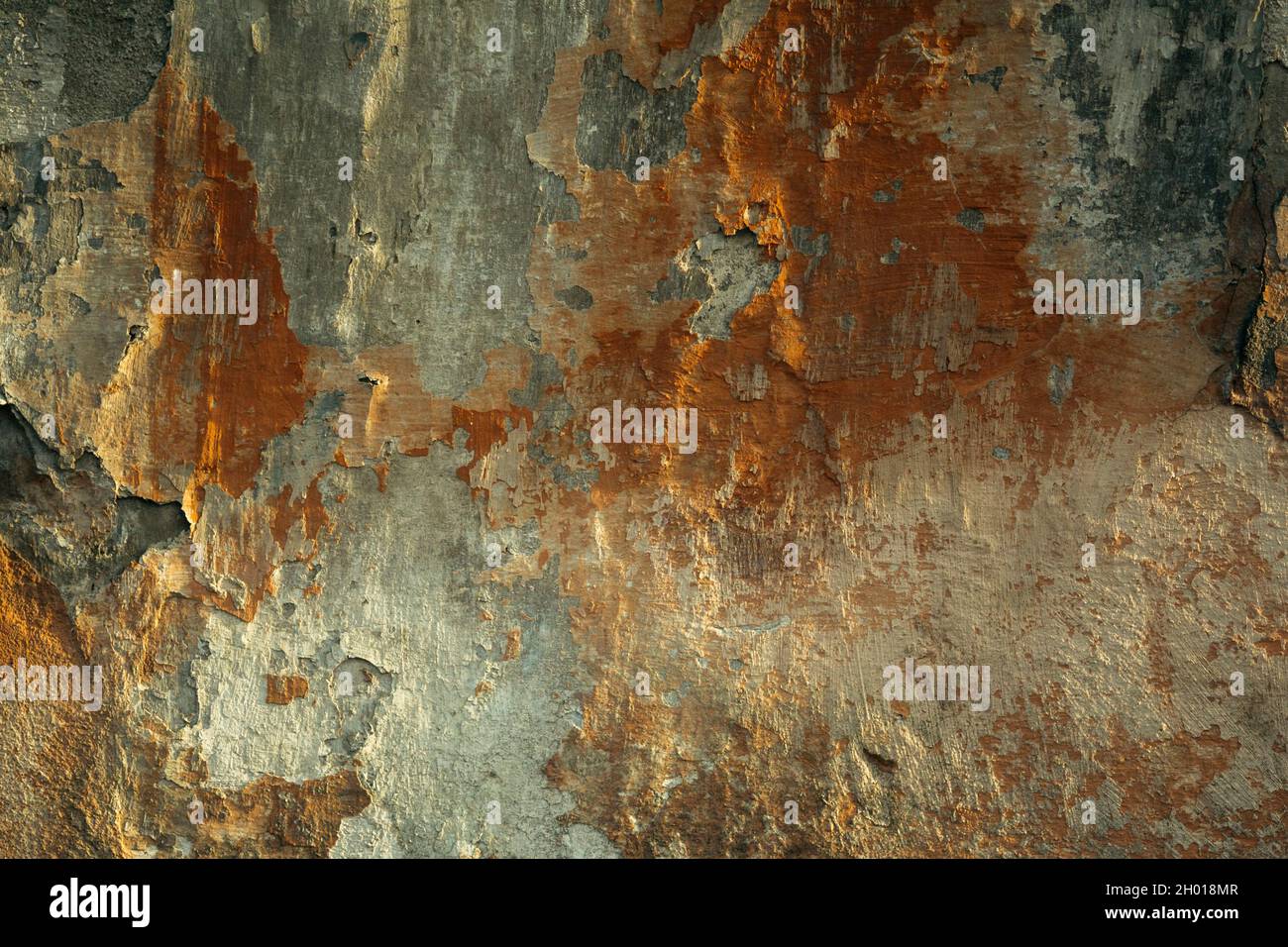 The texture of old crumbling plaster with paint on the wall Stock Photo ...