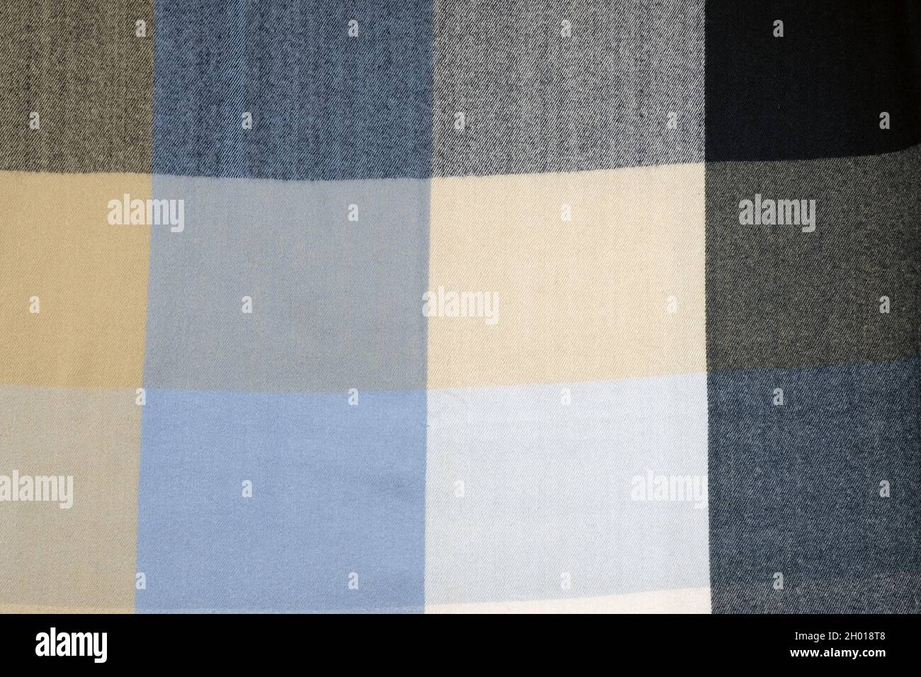 Checkered fabric texture. Woolen winter scarf background. Close-up of ...