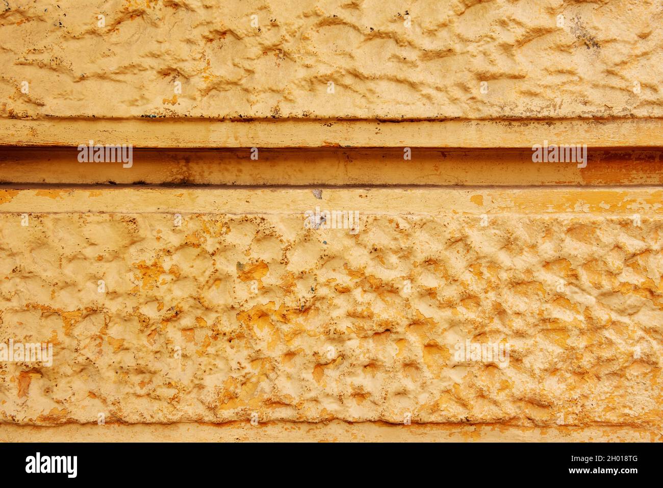 Cement wall of a building filled with decorative bas-reliefs. Vector ...