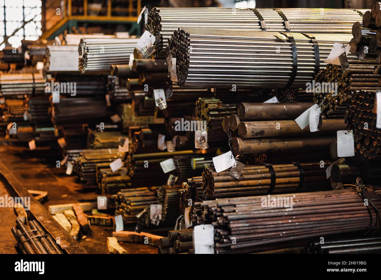 Hot rolled steel, bundle of round metal rods close-up Stock Photo - Alamy