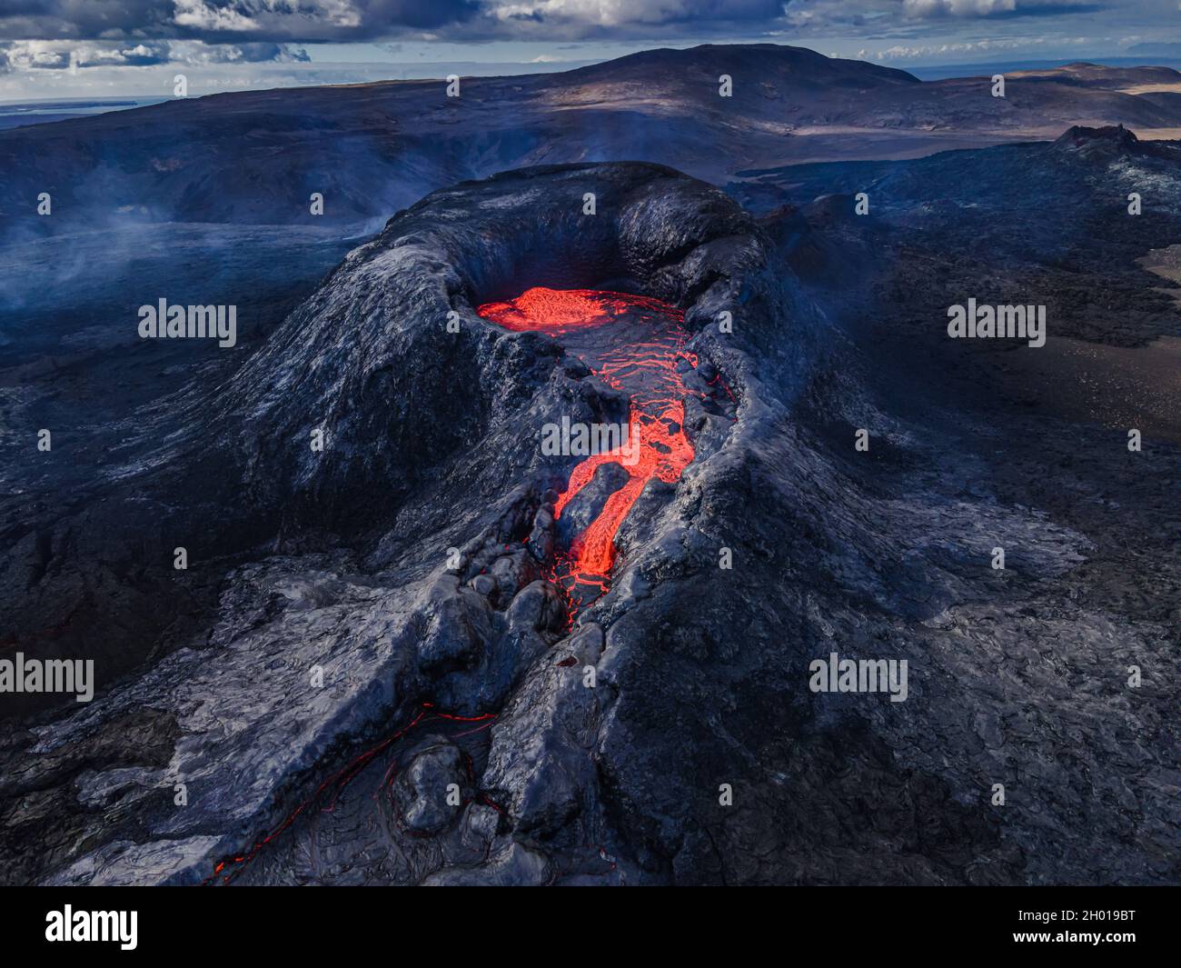 Crater opening from Fagradalsfjall volcano. View from above into the ...
