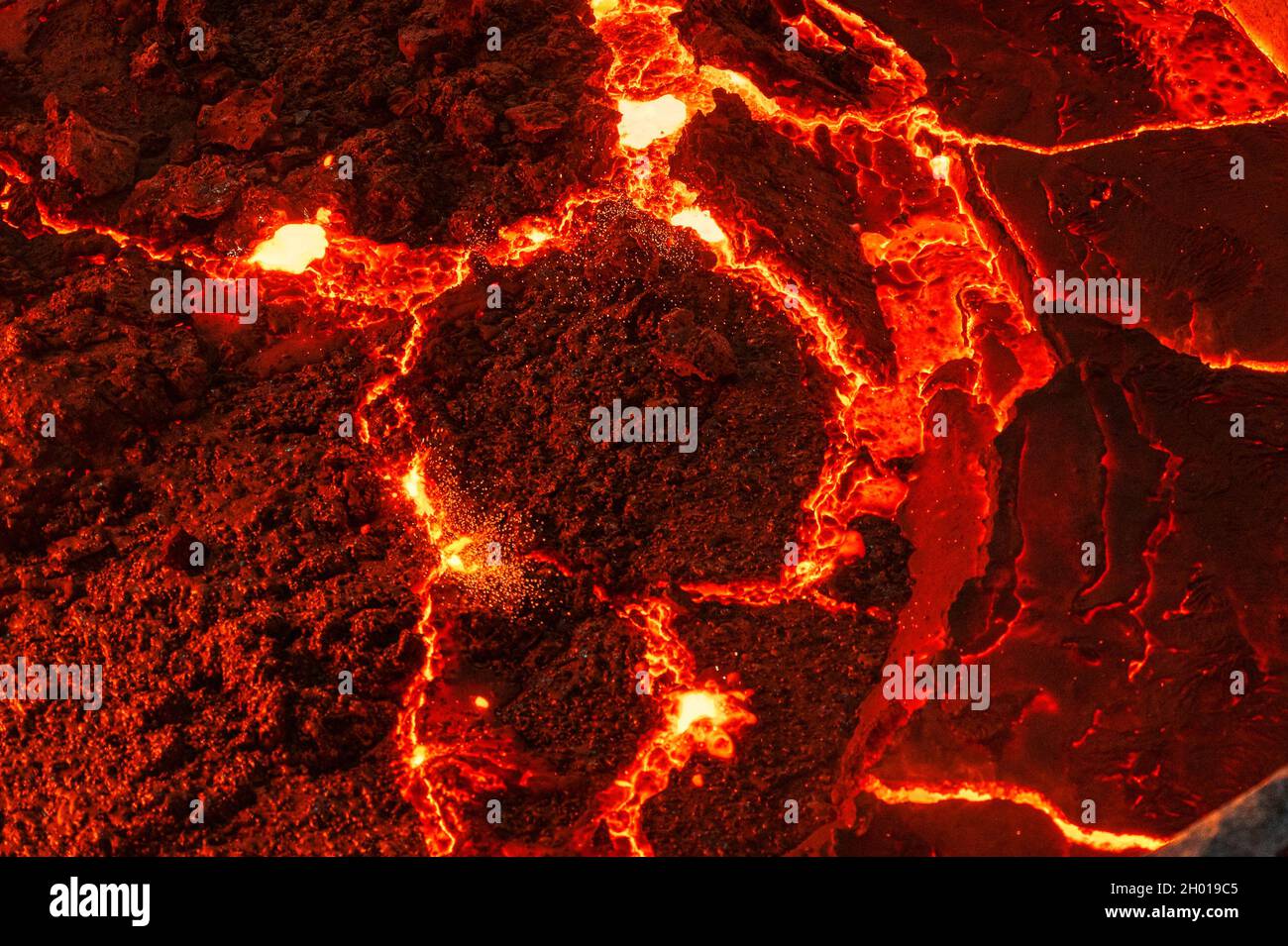 The surface of a hot liquid slag in a metallurgical ladle. Thick crust ...