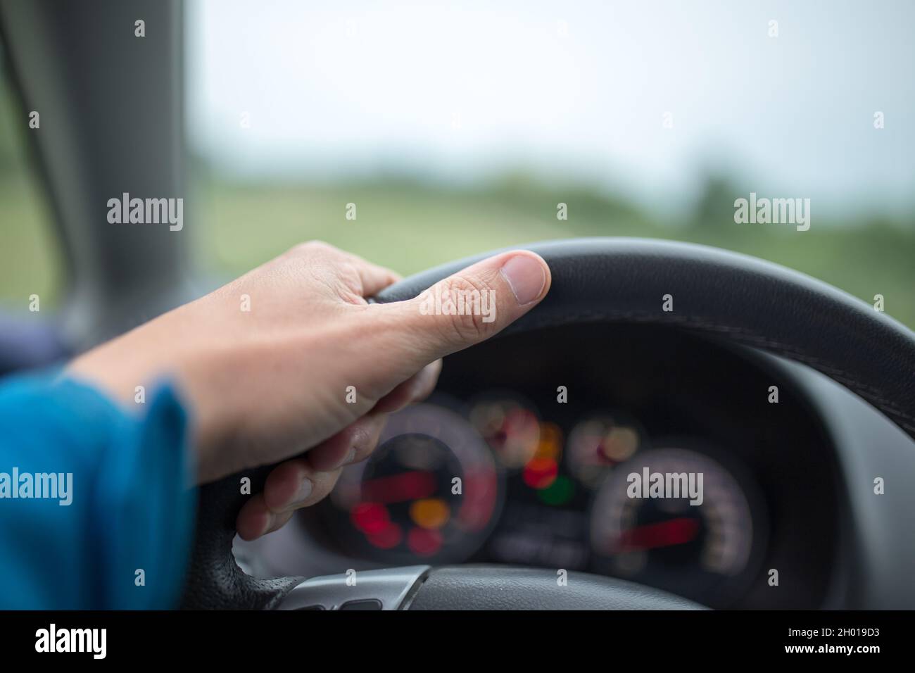 Hand holding steering wheel hi-res stock photography and images - Alamy