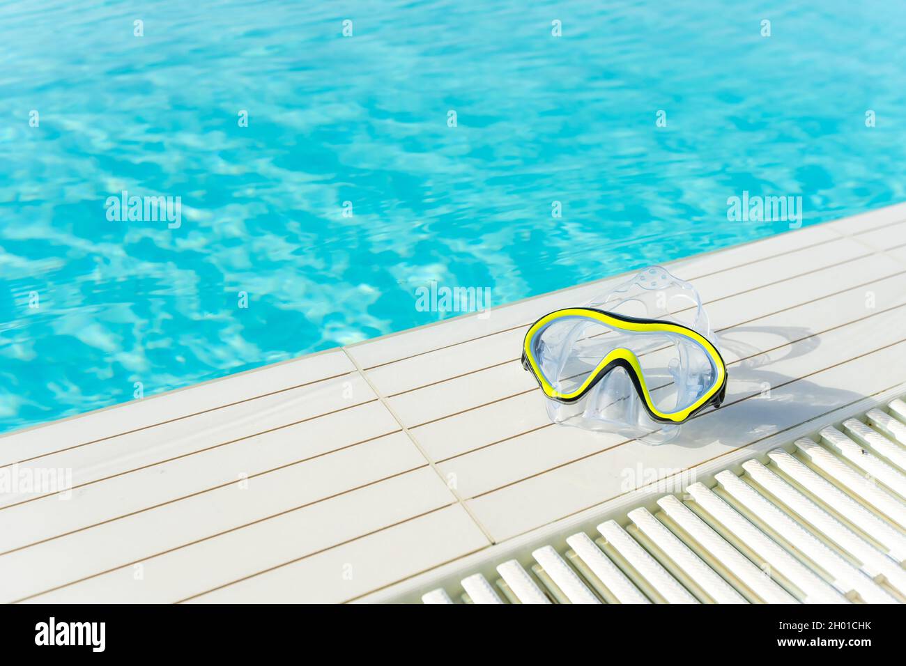 Underwater mask near the pool Stock Photo - Alamy