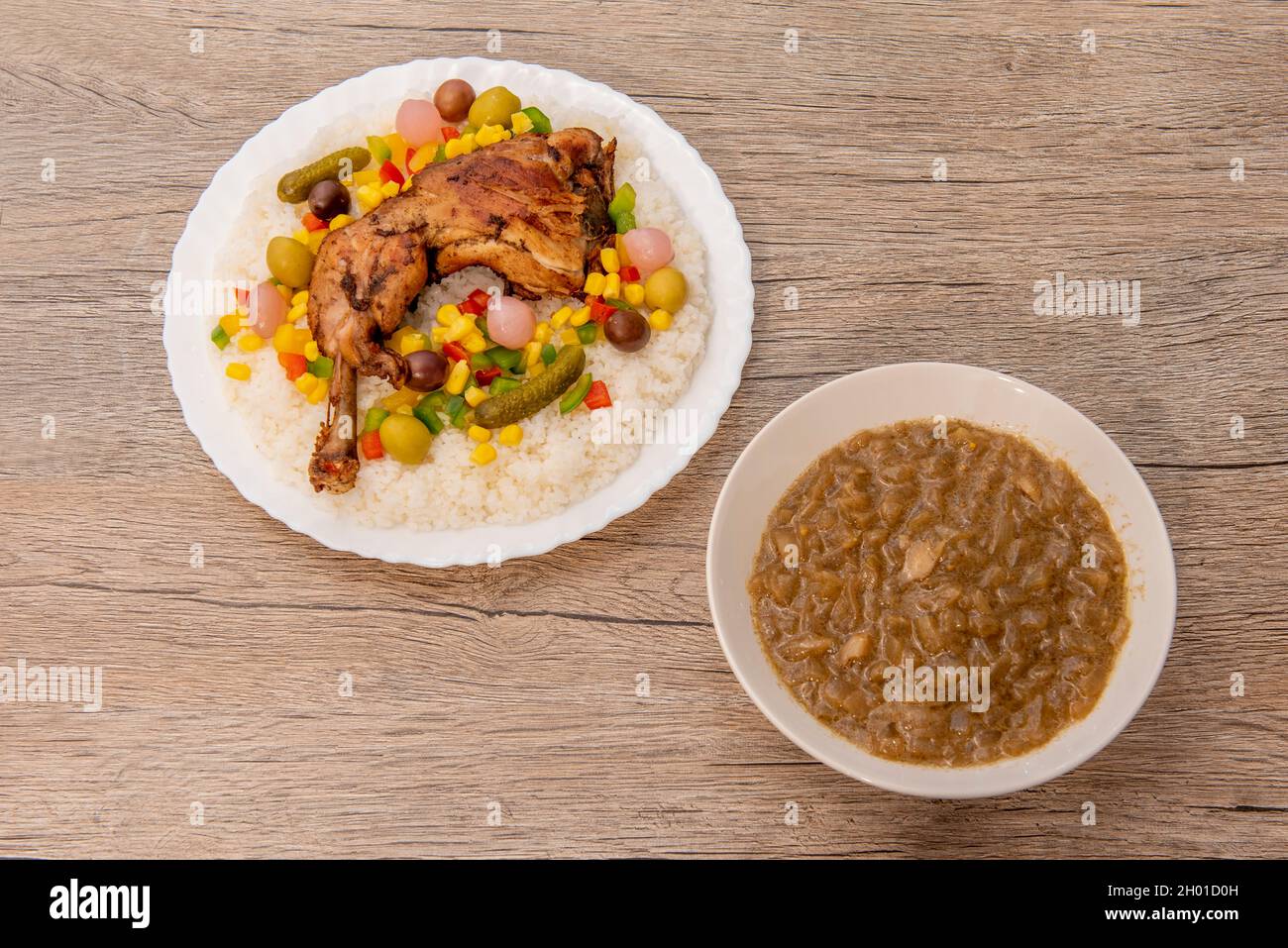 Typical Senegalese recipe for yassa with marinated spicy chicken, white ...