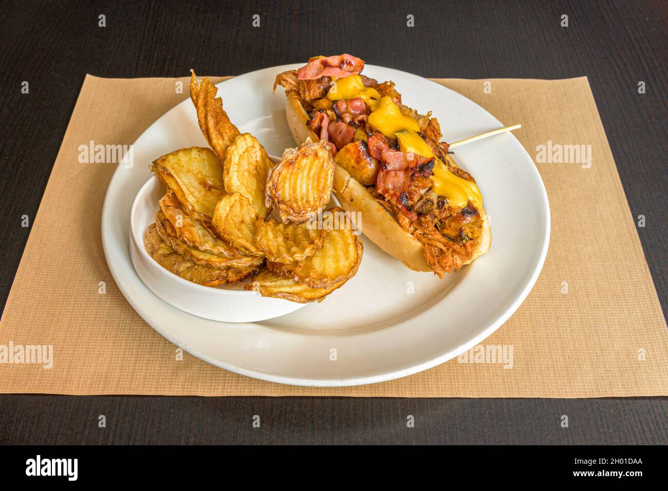 Shredded beef hot dog with sausage, fried bacon and cheddar cheese ...