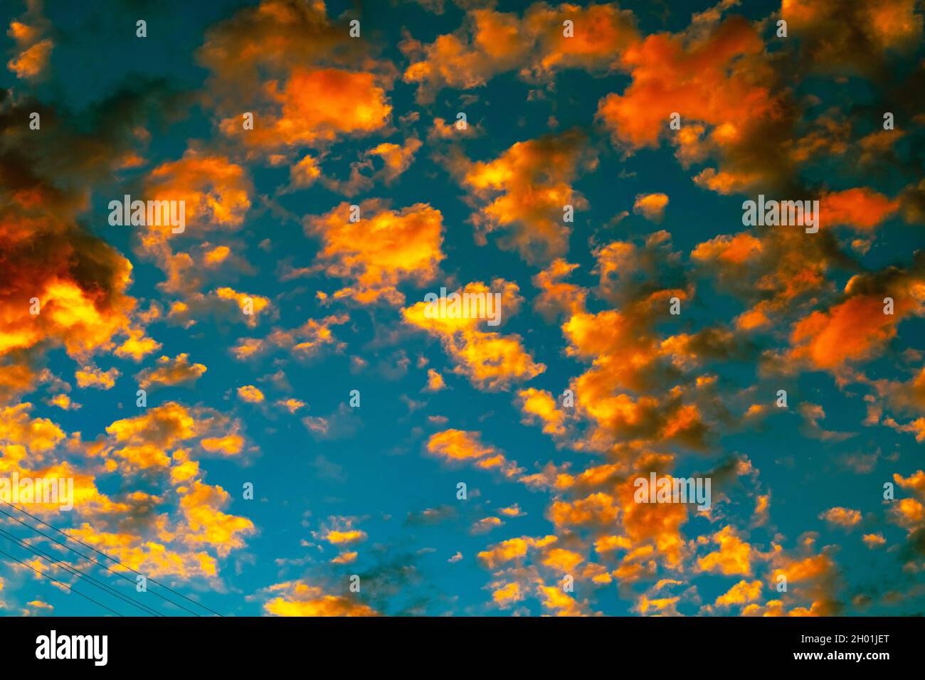 Dramatic orange clouds at sunset. Cloudscape abstract background photo ...