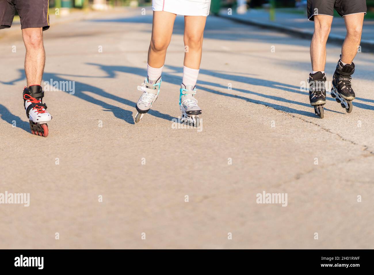 Three people legs shadow hi-res stock photography and images - Alamy