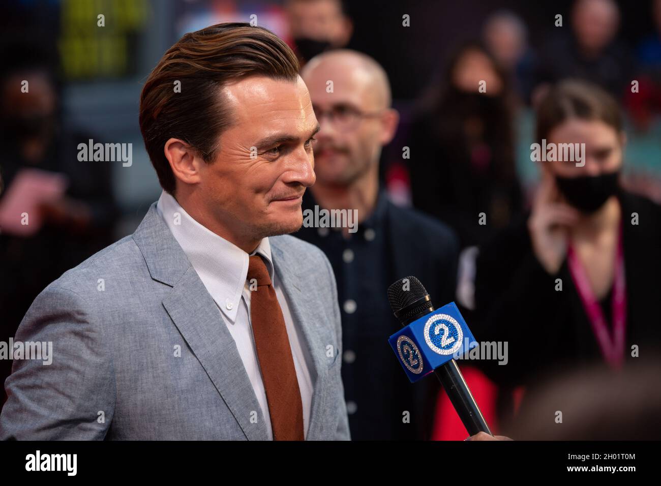 Rupert Friend is being interviewed by the Media at The French Dispatch ...
