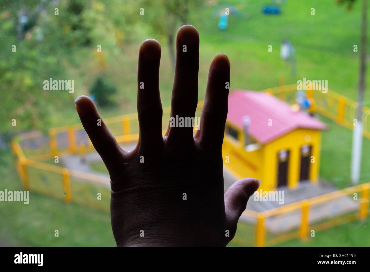 Hand shadow on glass against sky background close up Stock Photo - Alamy