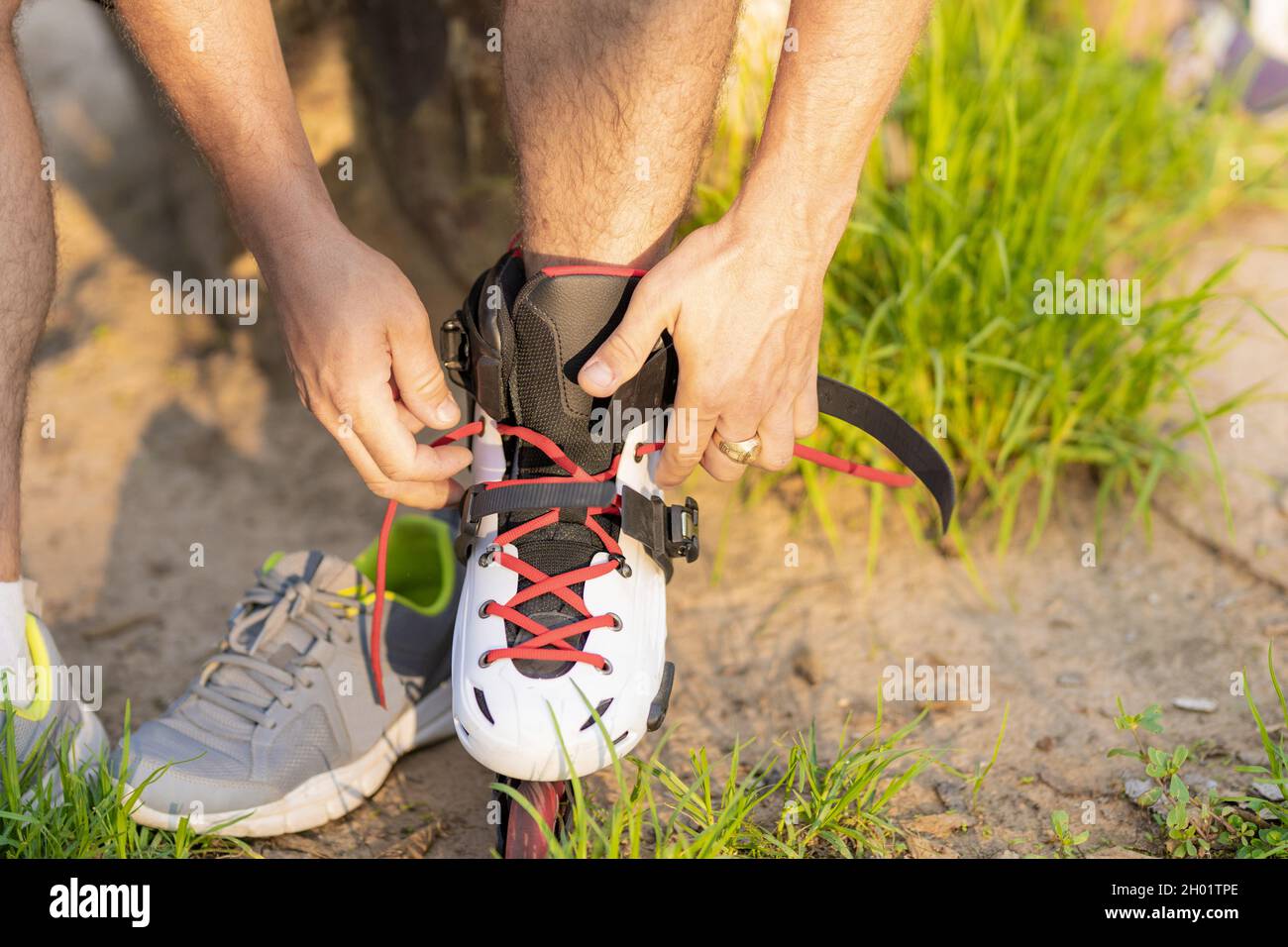 Person putting on shoe hi-res stock photography and images - Alamy