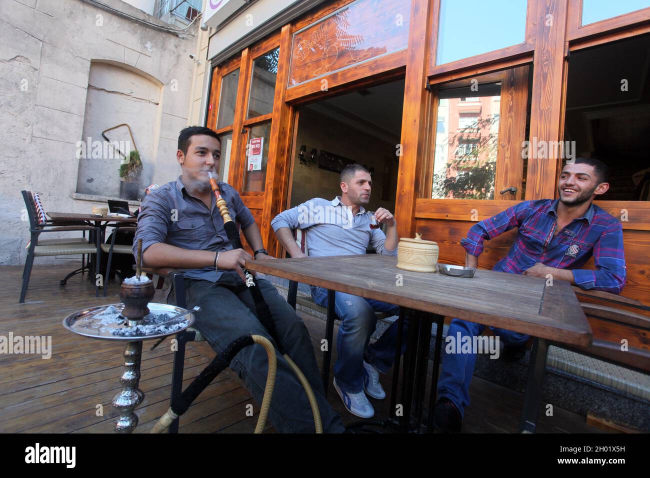 ISTANBUL, TURKEY - JANUARY 5: People smoke hookah (Nargile) on January ...