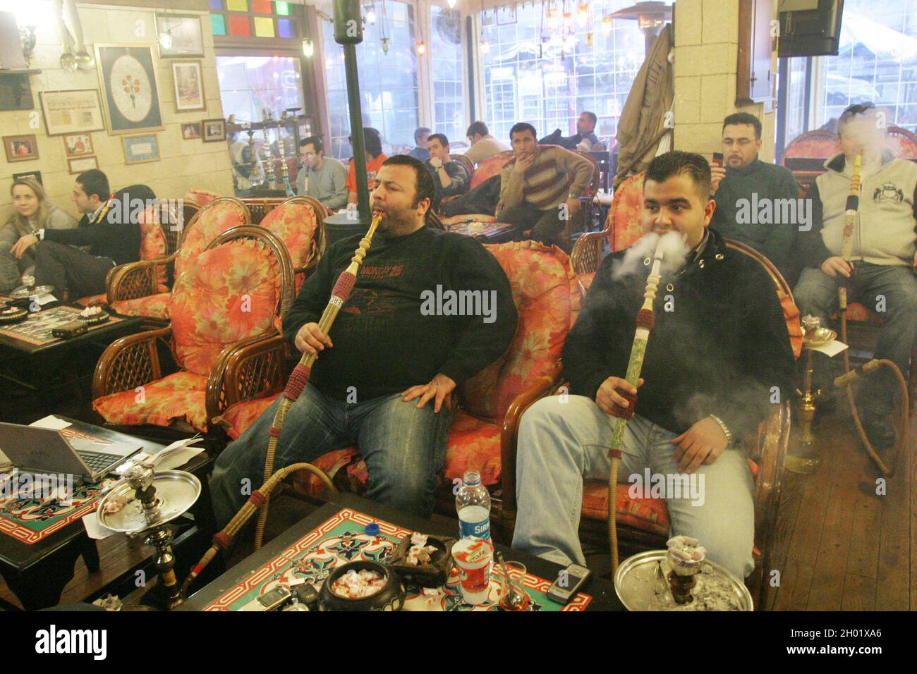 ISTANBUL, TURKEY - JANUARY 5: People smoke hookah (Nargile) on January ...