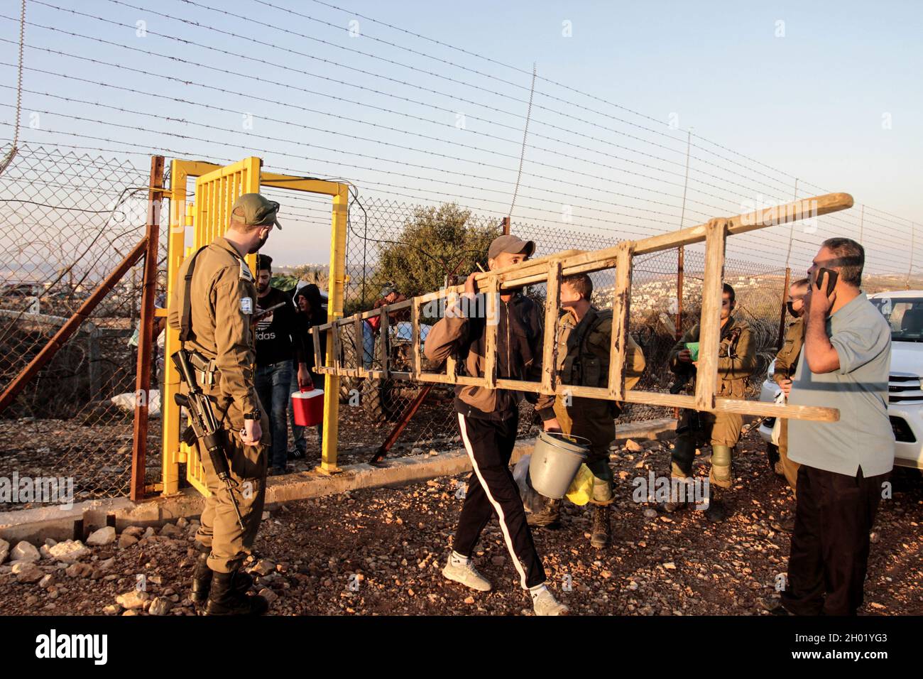 Salfit, Palestine. 10th Oct, 2021. Israeli soldiers are seen guarding ...