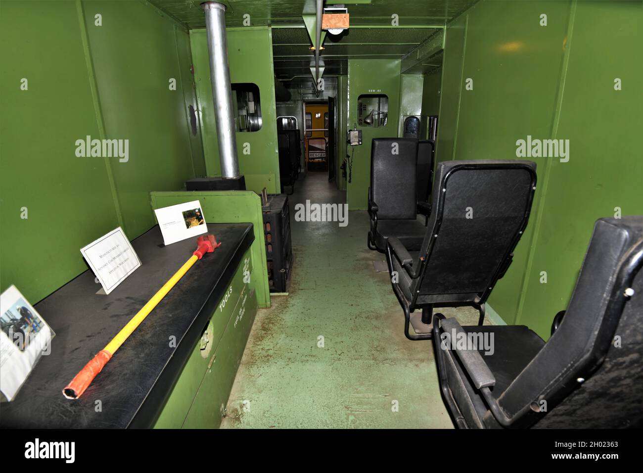 Green railroad caboose Stock Photo - Alamy
