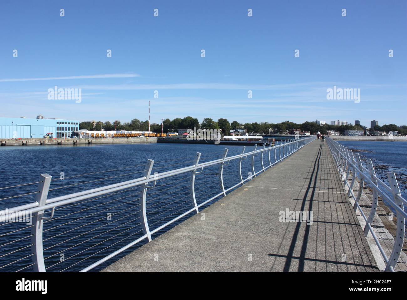The walkway to the Ogden Point lighthouse in Victoria, BC Stock Photo ...