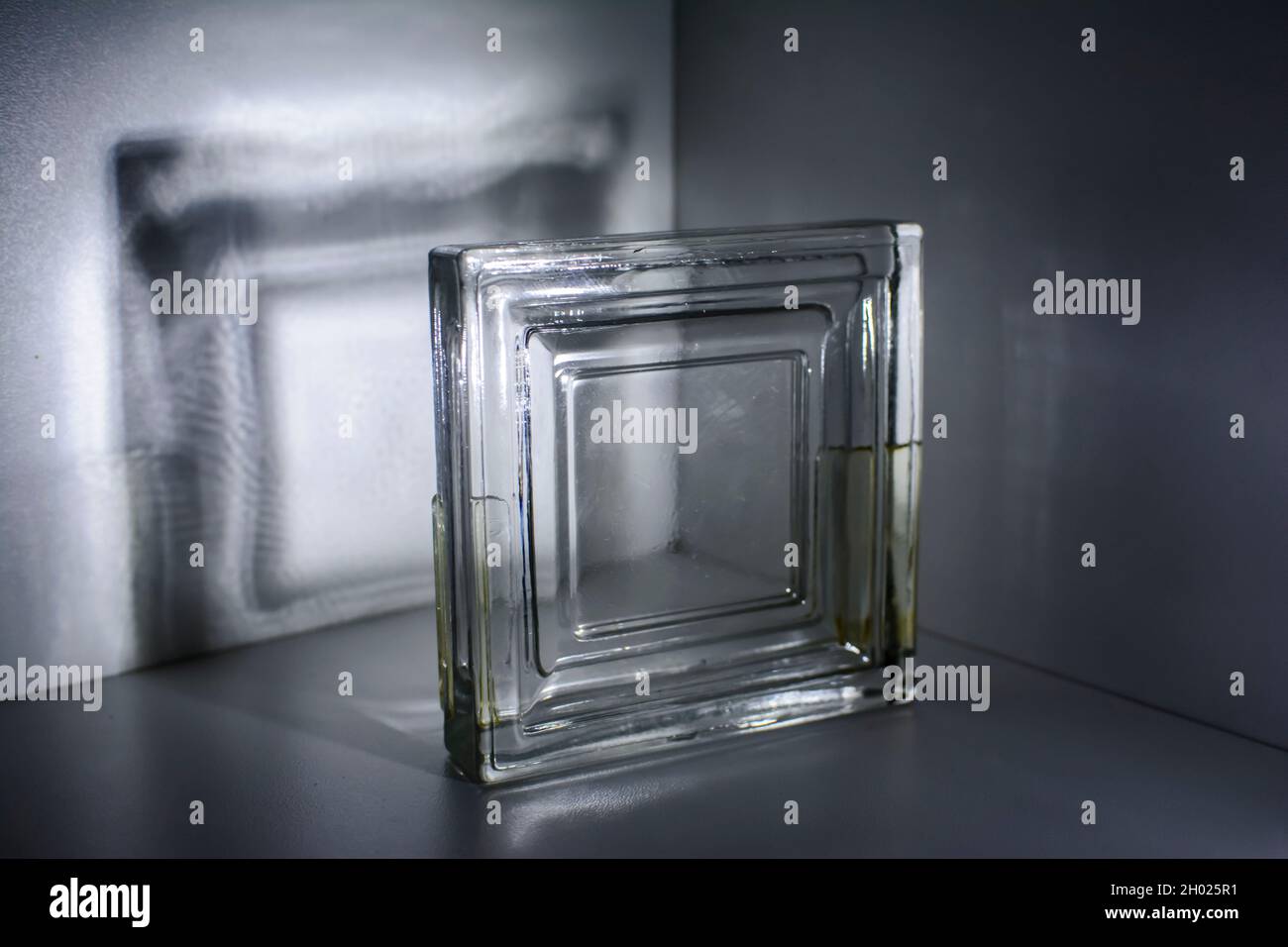 Decorative objects made of glass, plastic and wood in the interior of ...