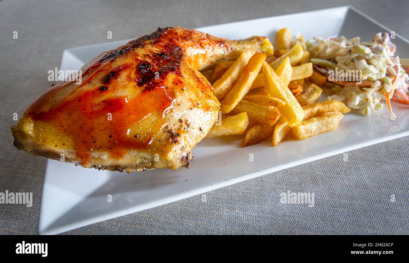 BBQ Chicken platter with fries and coleslaw Stock Photo - Alamy