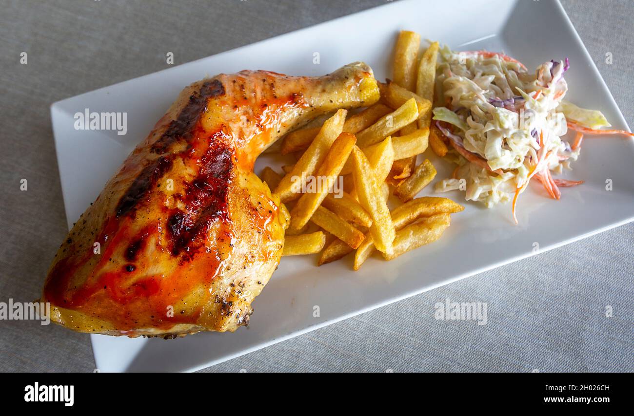 BBQ Chicken platter with fries and coleslaw Stock Photo - Alamy