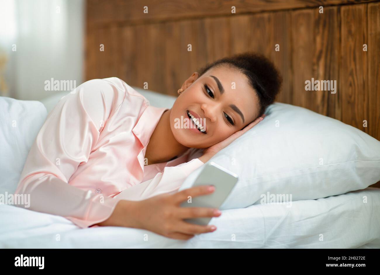 Woman searching under bed hi-res stock photography and images - Alamy